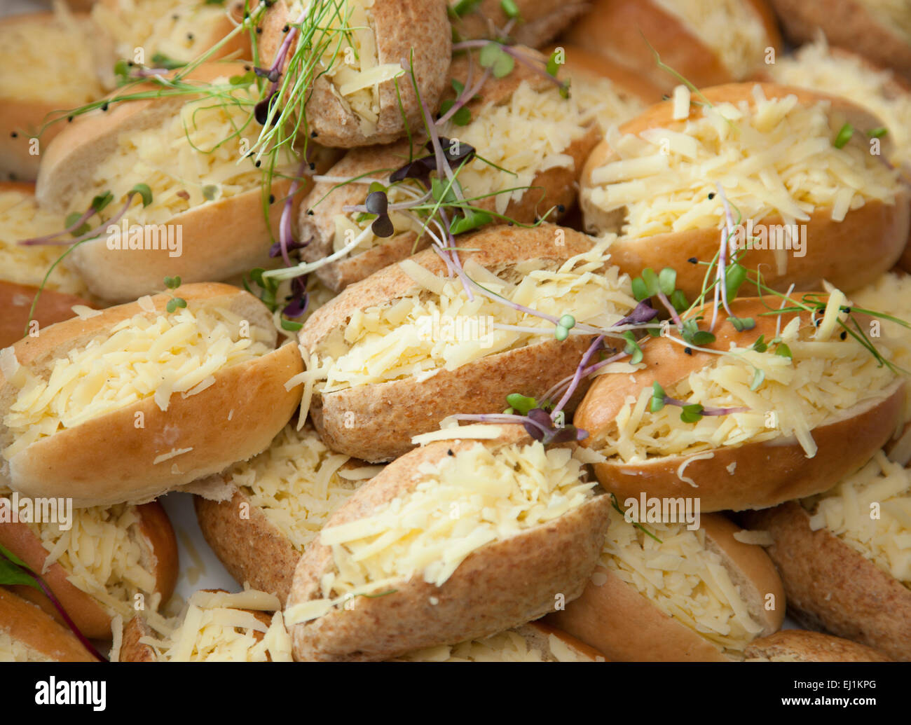 Grated cheddar cheese rolls hi-res stock photography and images - Alamy