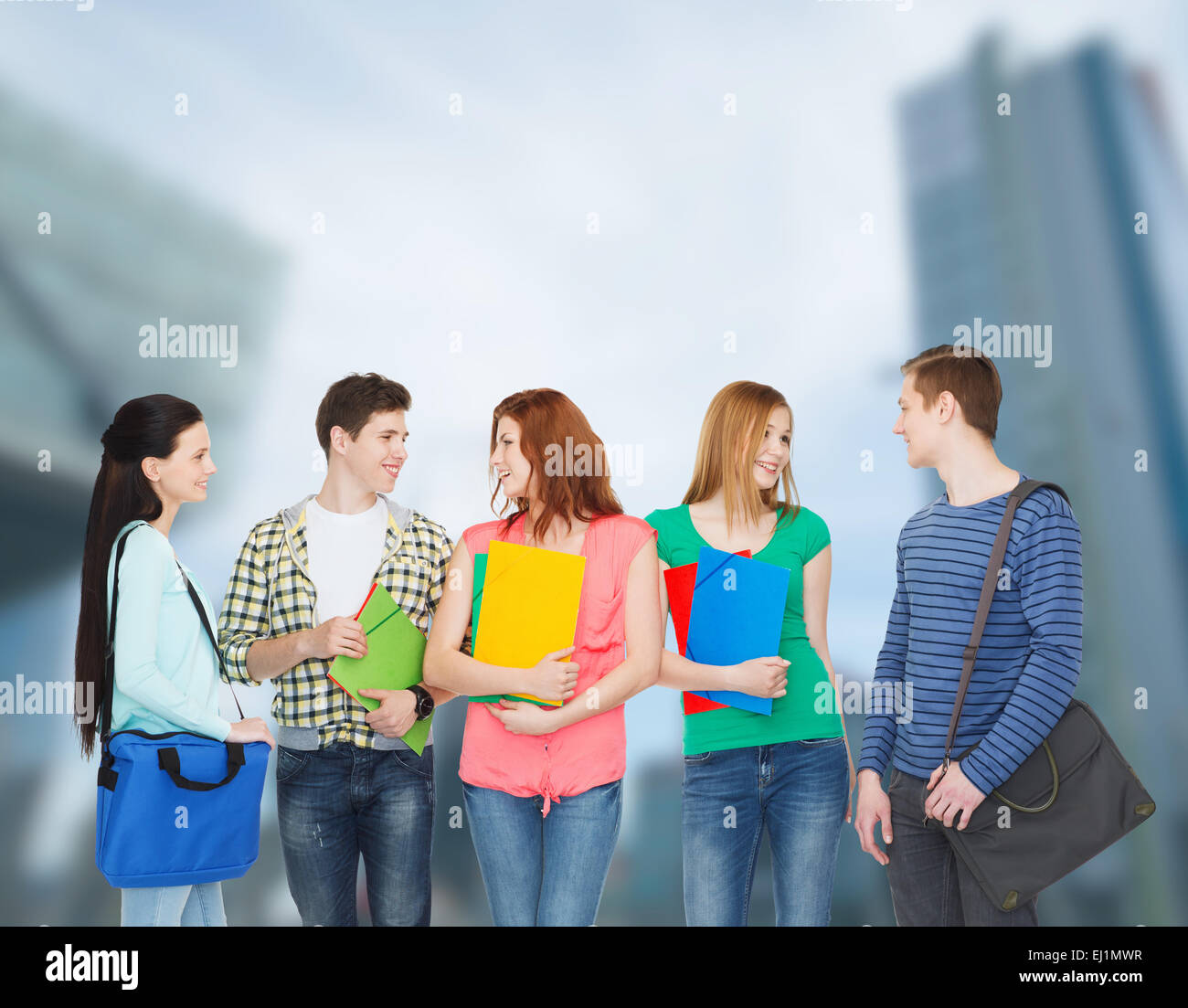 group of smiling students standing Stock Photo - Alamy