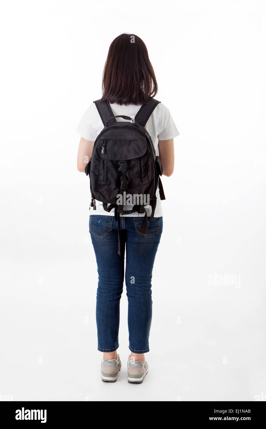 Teenage girl standing with rear view Stock Photo - Alamy