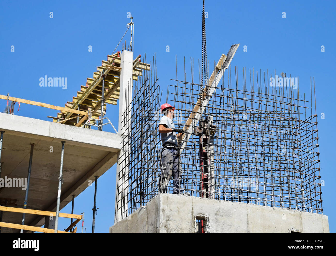 Man is working at the construction site Stock Photo - Alamy