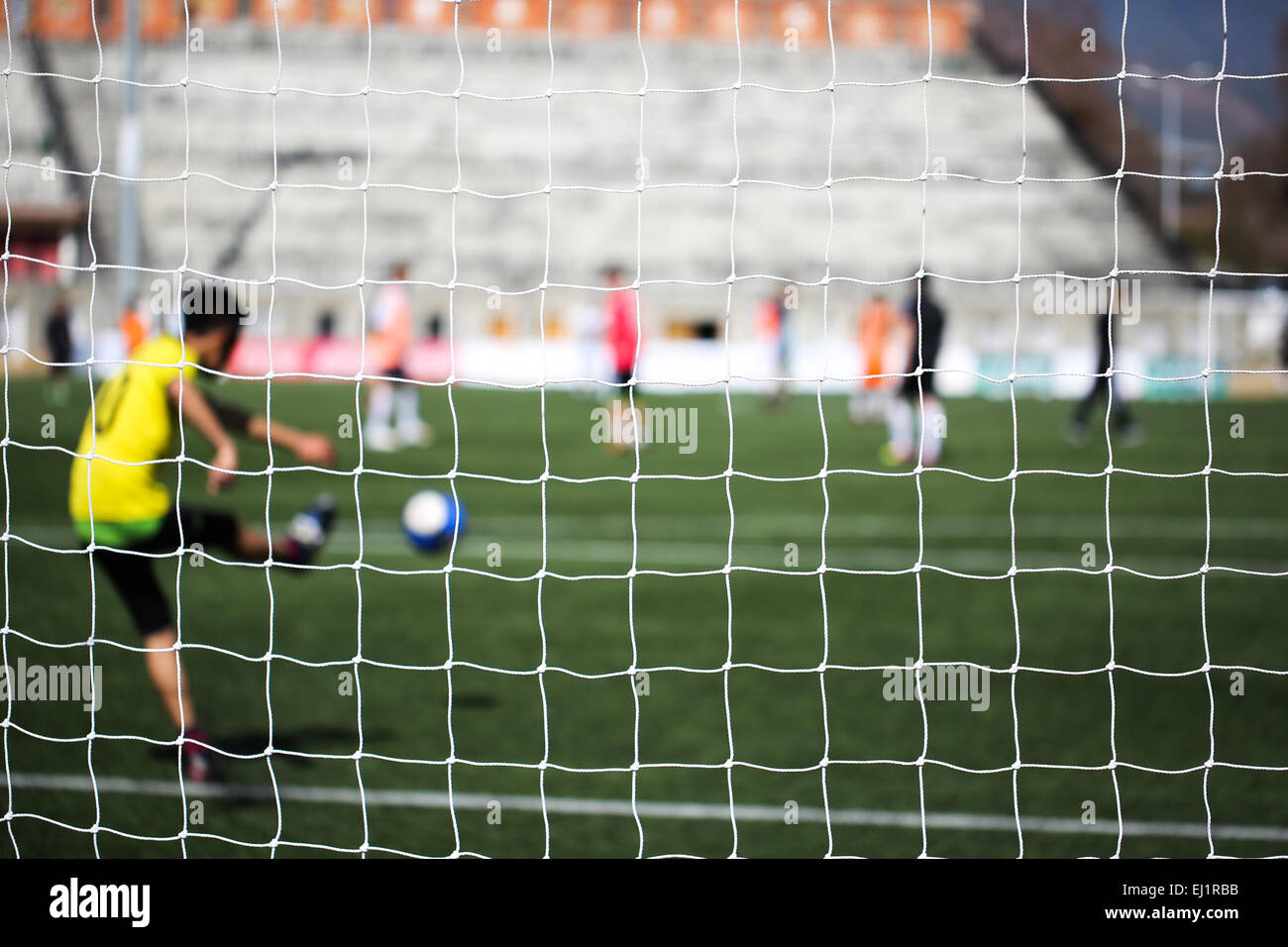 Goal net football behind hi-res stock photography and images - Alamy