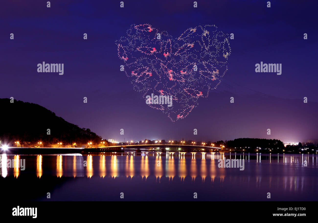 heart sparkle Fireworks celebrating over bridge of Lake Kawaguchiko at ...