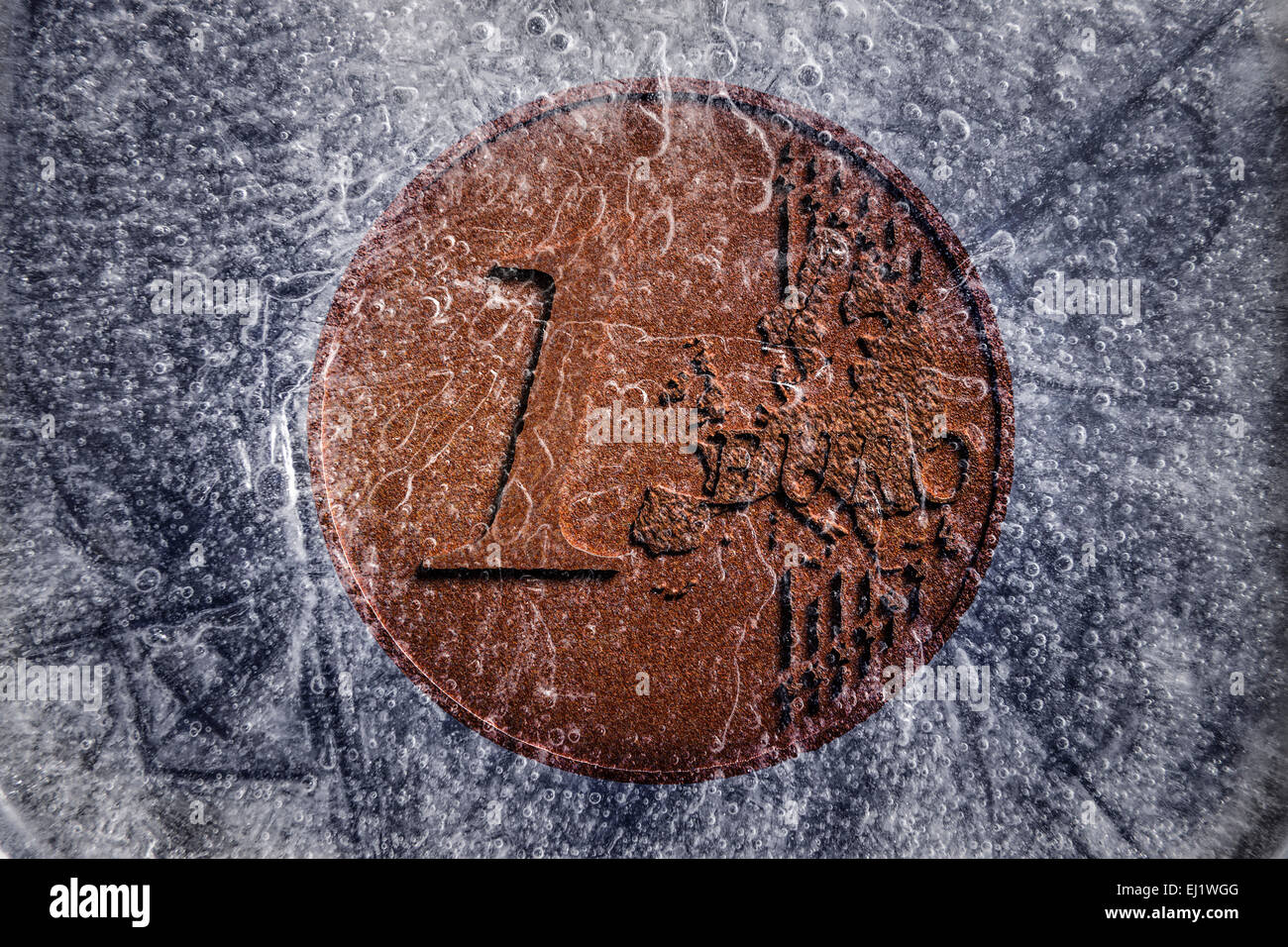 Rusty euro coin, one cent coin under a layer of ice Stock Photo - Alamy