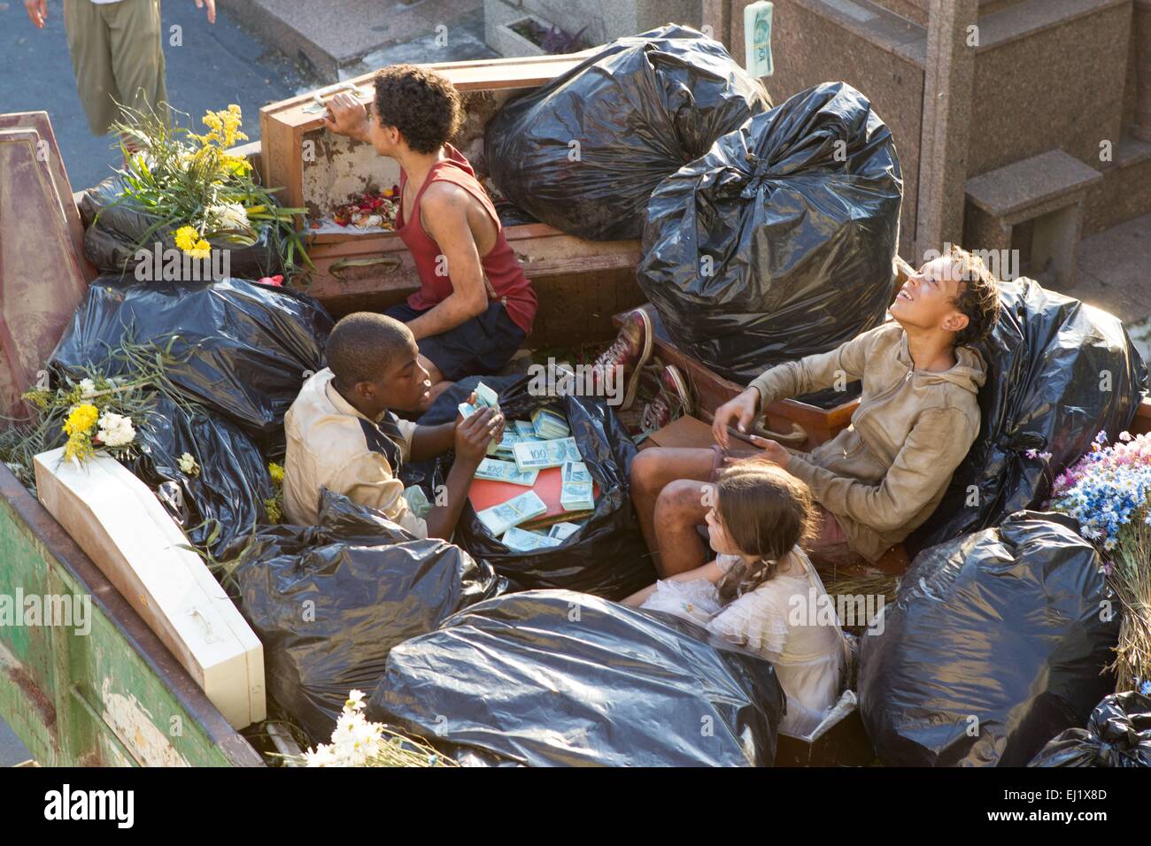 Children pick trash poor hi-res stock photography and images - Alamy