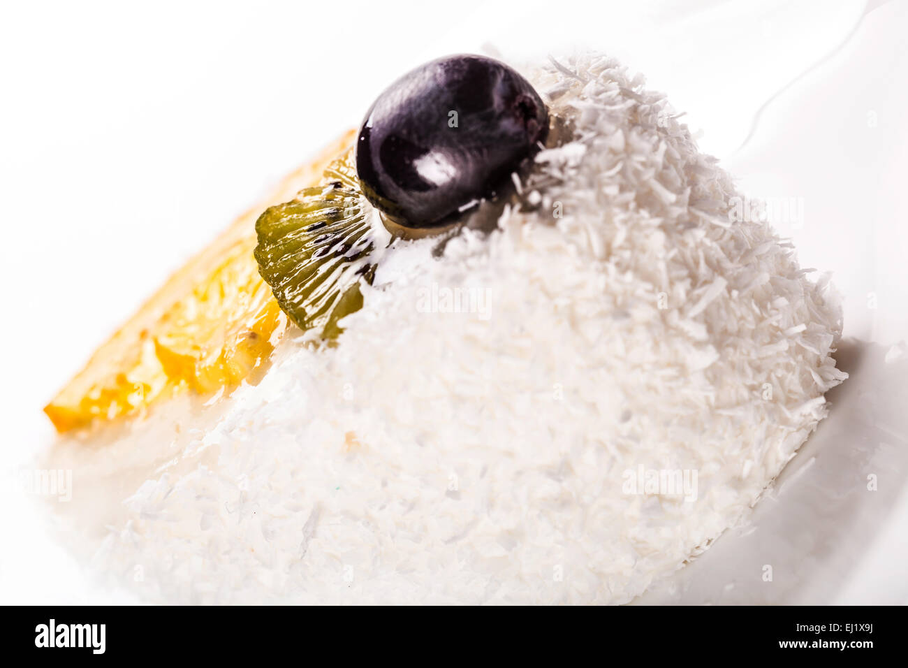 tasty cake slice close-up on a white background Stock Photo - Alamy