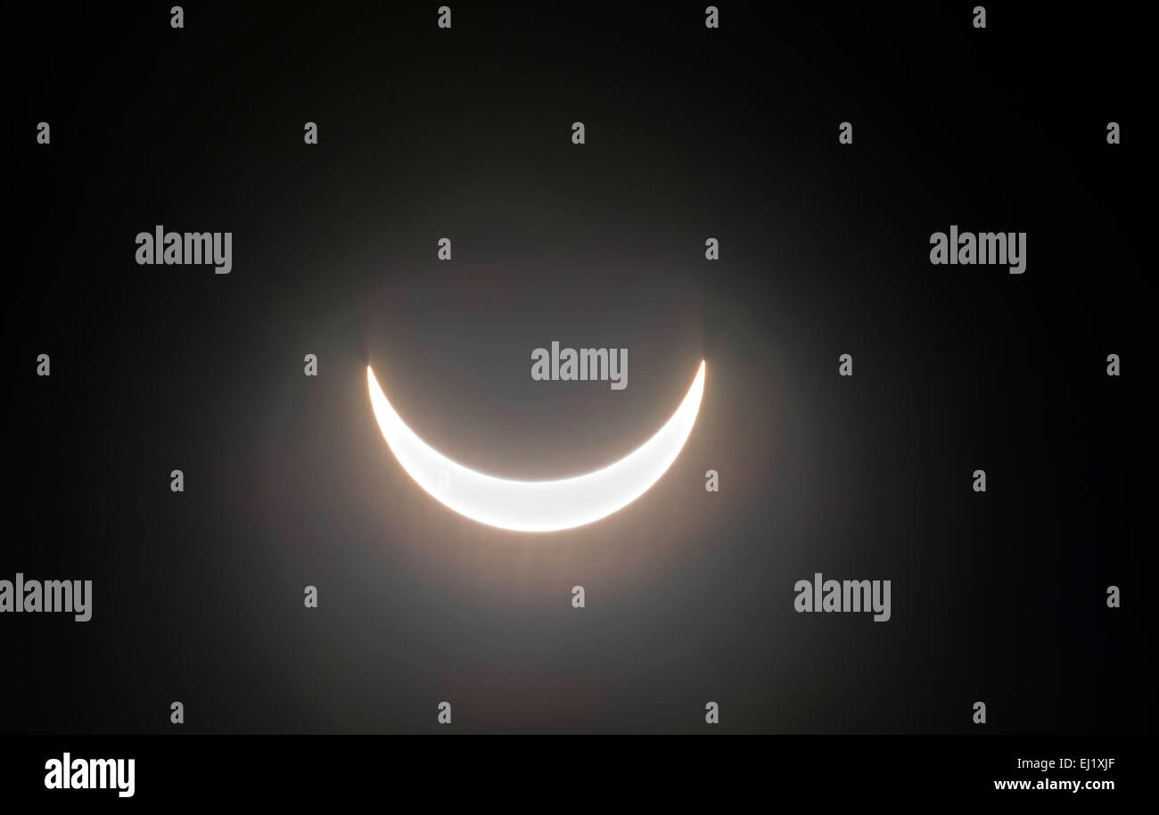 Partial Eclipse over Helston Cornwall in 2015 Stock Photo - Alamy