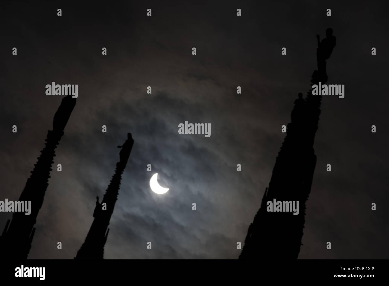 Milan, Italy - 20 March 2015: Partial solar eclipse seen through the ...