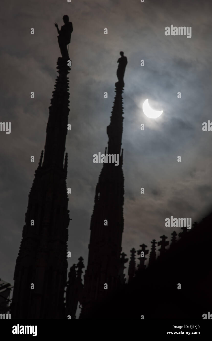Milan, Italy - 20 March 2015: Partial solar eclipse seen through the ...