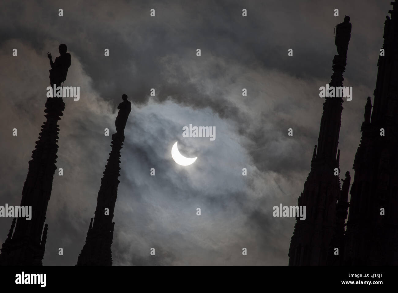Milan, Italy - 20 March 2015: Partial solar eclipse seen through the ...