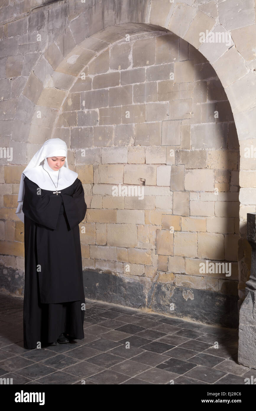 Young novice nun hi-res stock photography and images - Alamy