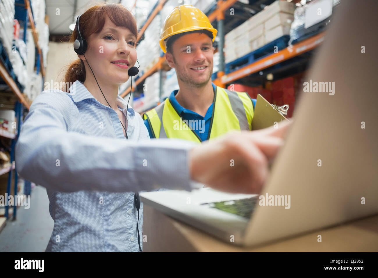 Female logistics manager wearing headset hi-res stock photography and images - Alamy