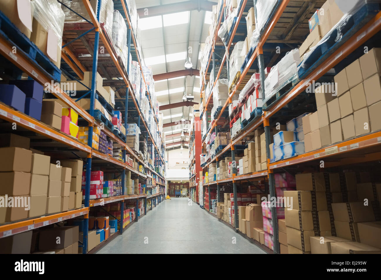 Shelves with boxes in warehouse Stock Photo - Alamy