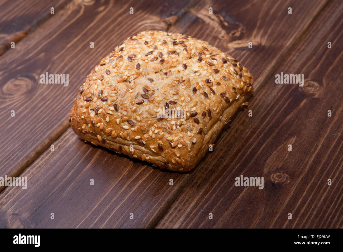 Fresh, squared wholemeal bread with sunflower seeds, sesame and others ...