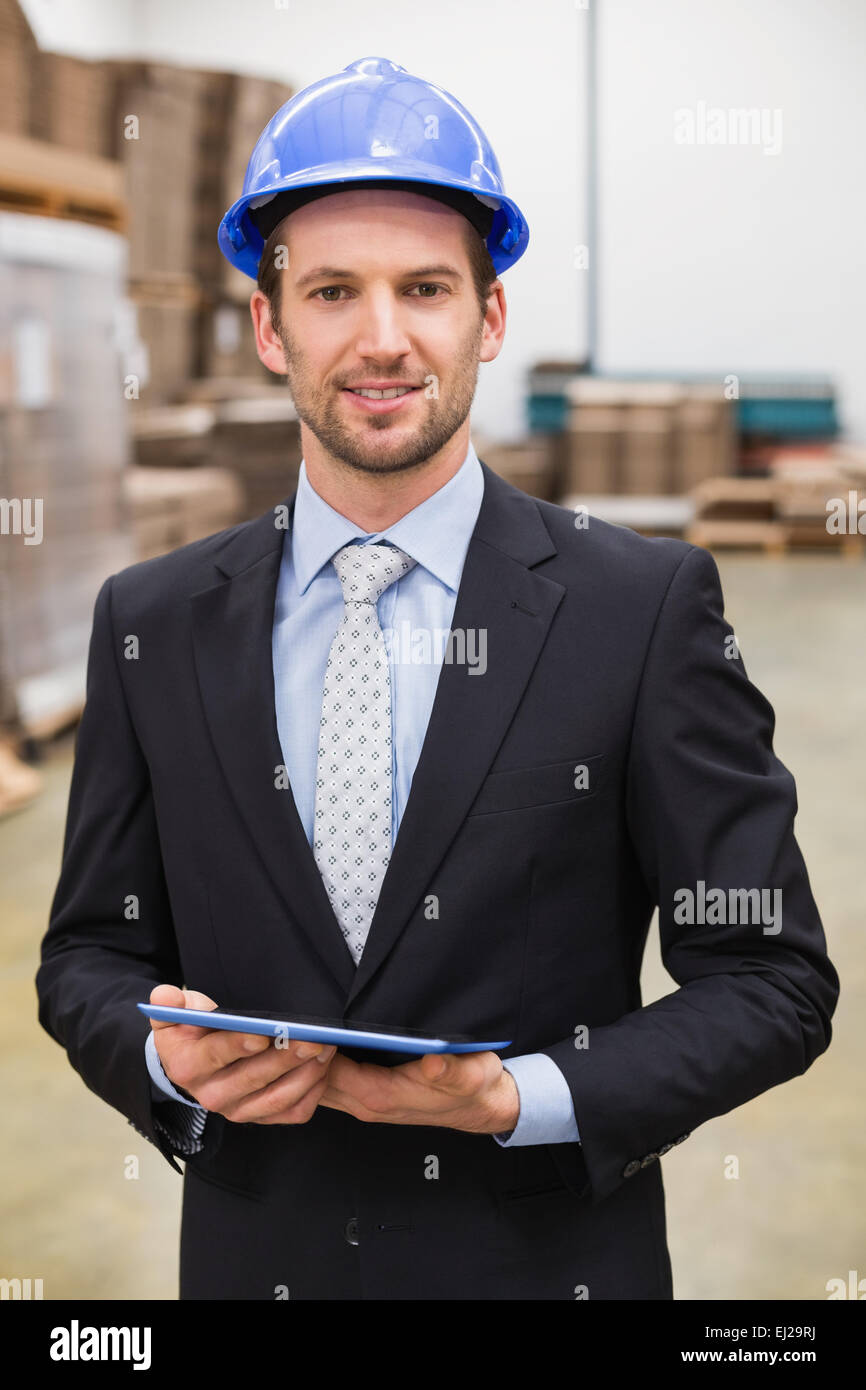 Worker wearing hard hat using hi-res stock photography and images - Alamy