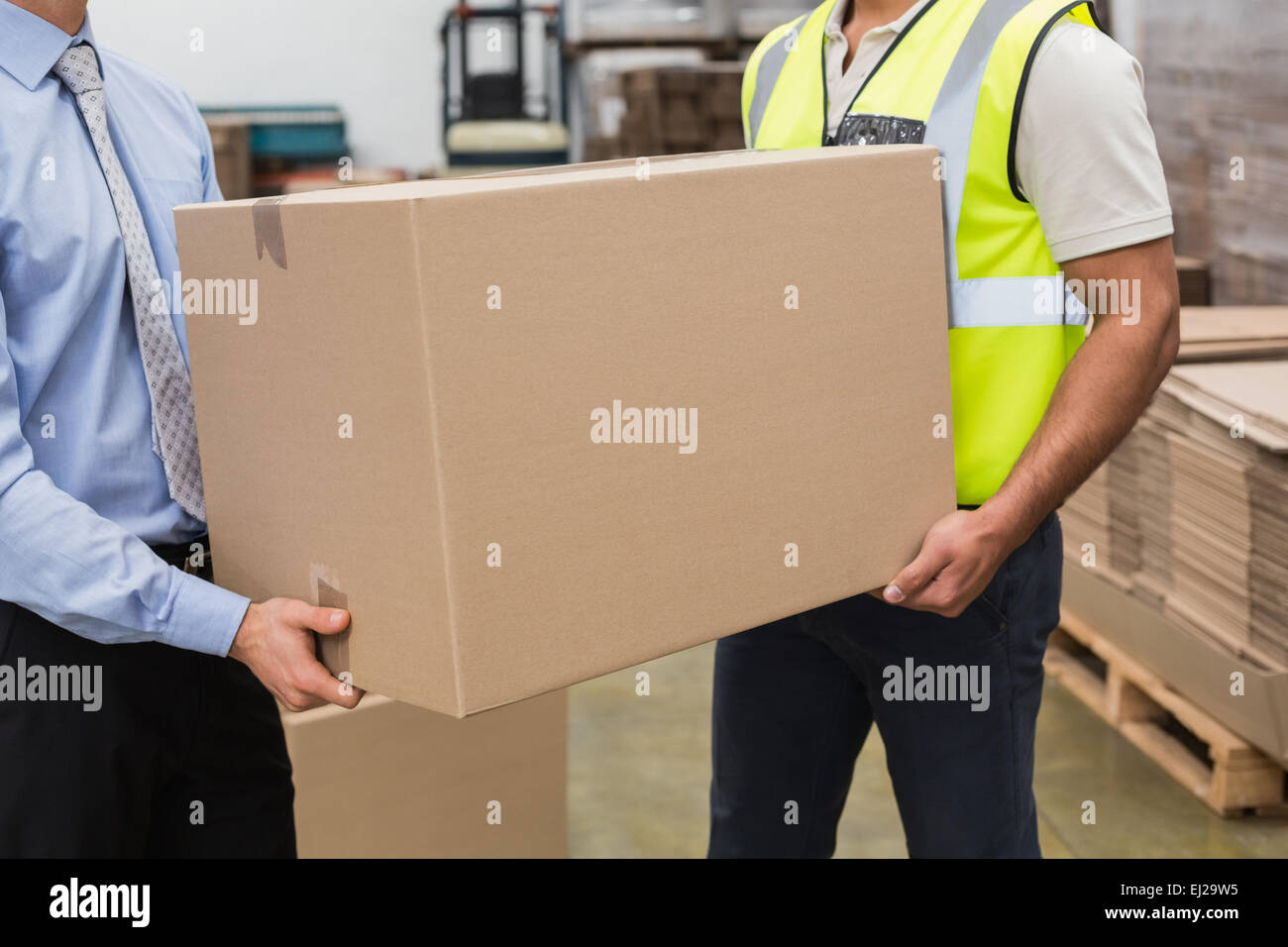 Man passing box hi-res stock photography and images - Alamy