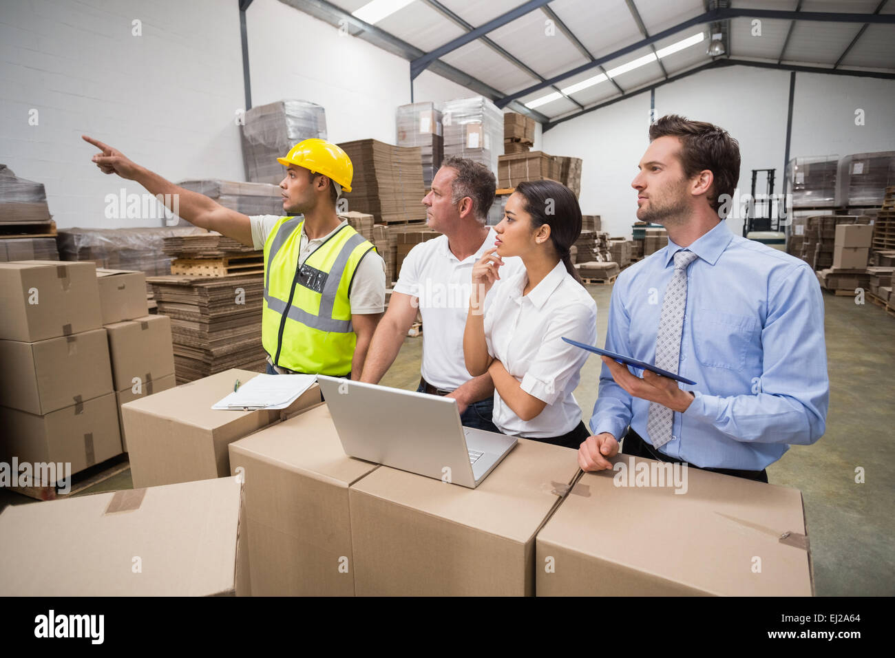 Worker pointing hi-res stock photography and images - Alamy