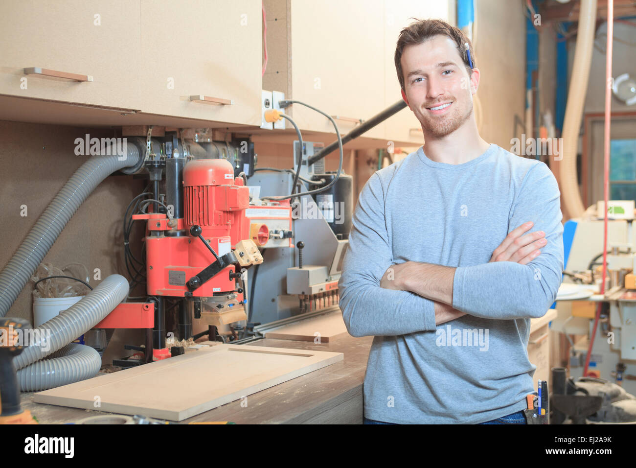 A carpenter working hard at the workshop Stock Photo - Alamy
