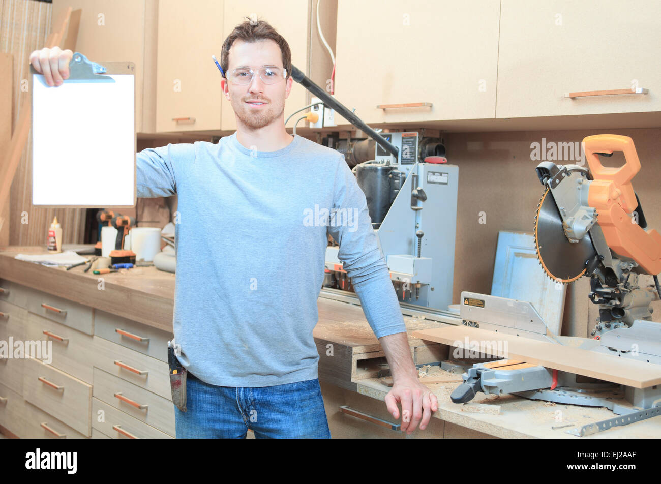 A Carpenter working hard at the shop Stock Photo - Alamy