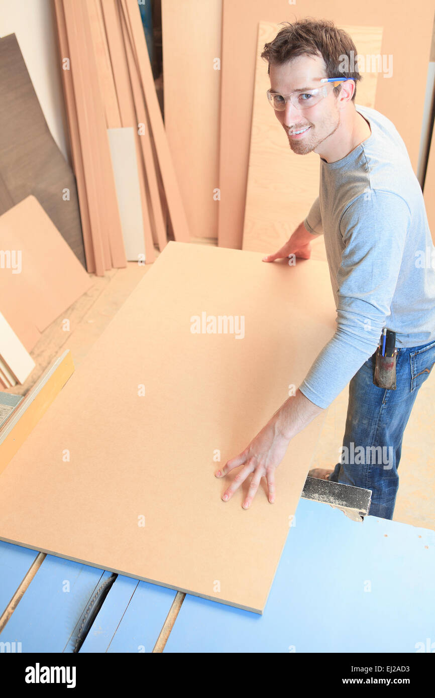 A carpenter working hard at the workshop Stock Photo - Alamy