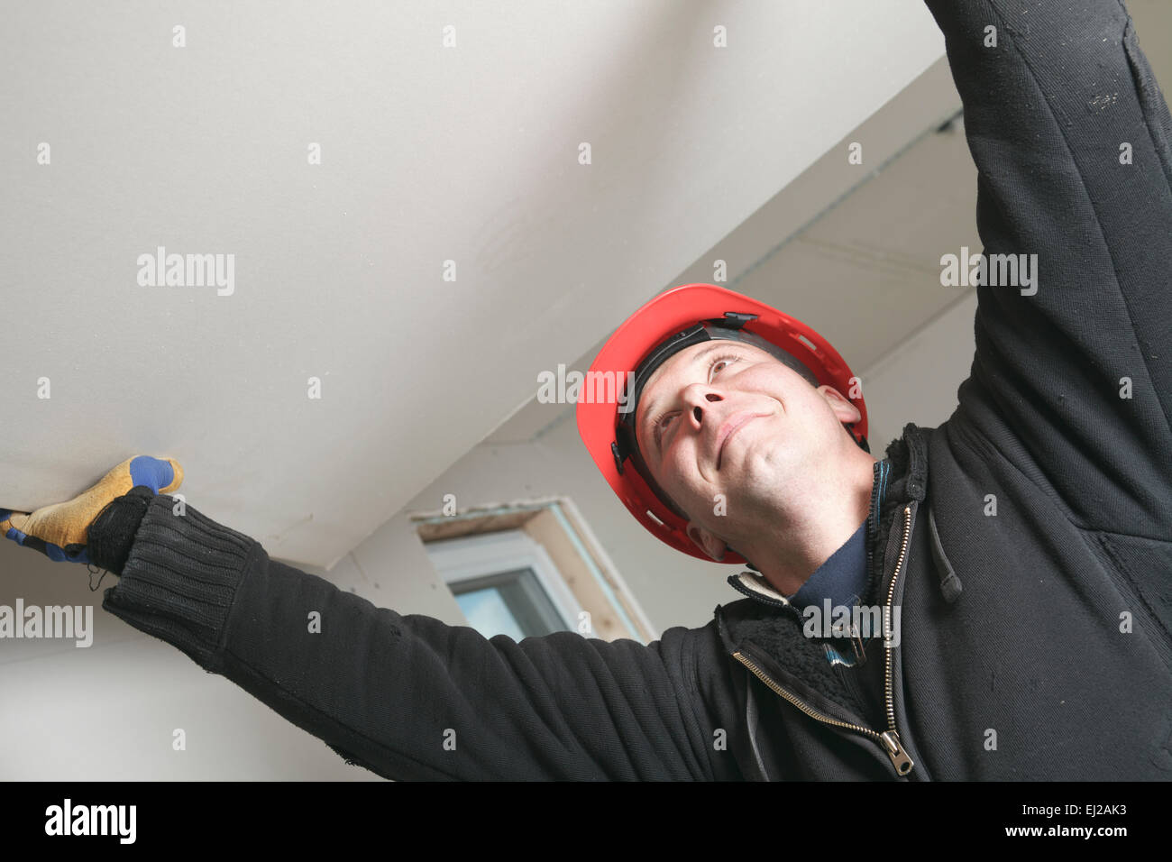 A construction men working outside Stock Photo - Alamy