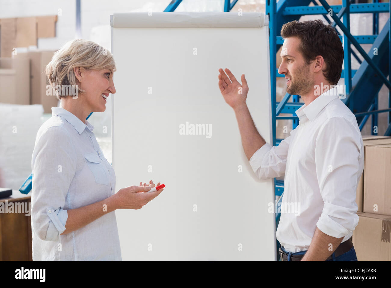 Manager speaking to colleague hi-res stock photography and images - Alamy