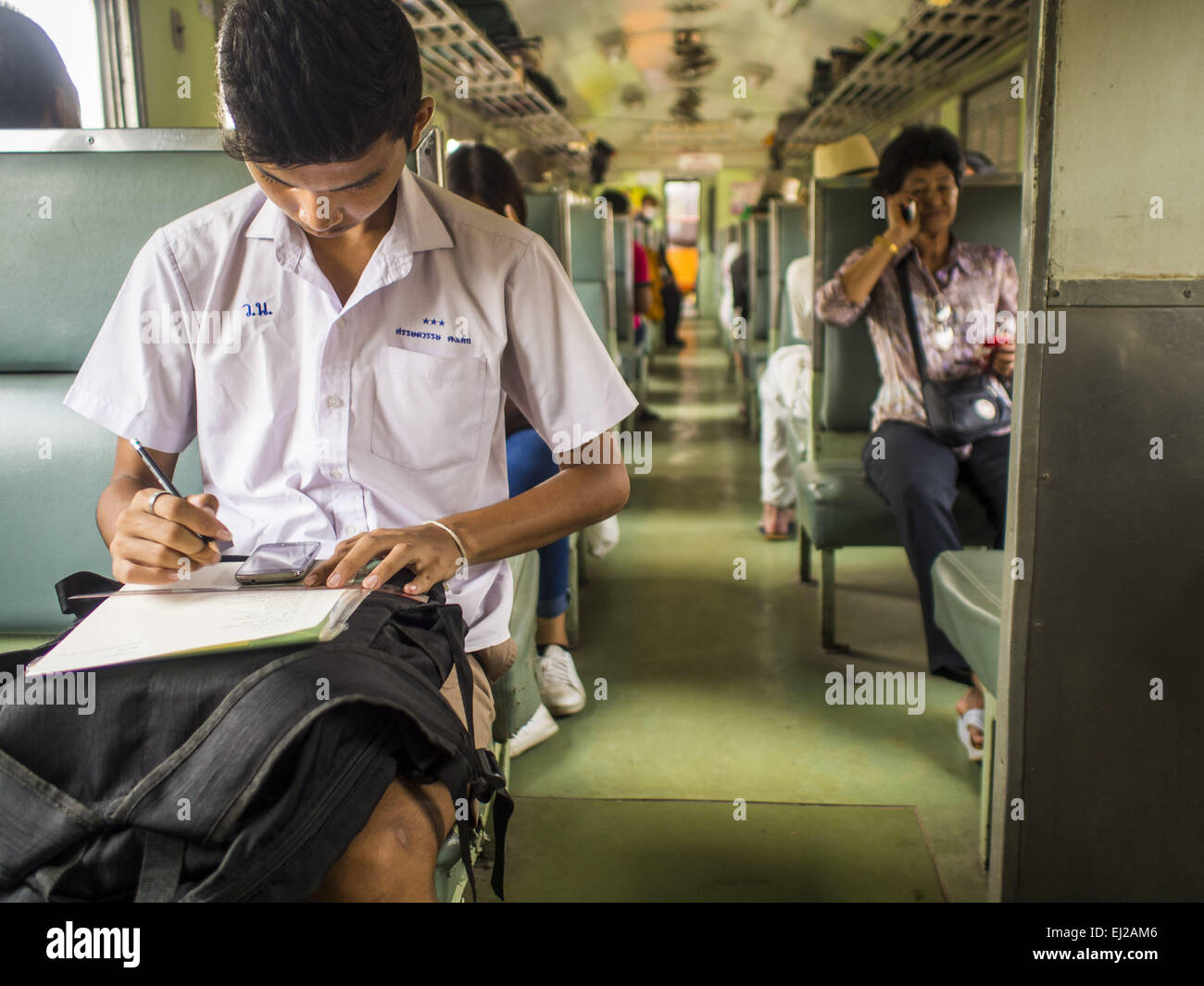 Kabin Buri, Prachinburi, Thailand. 20th Mar, 2015. A teenager does ...