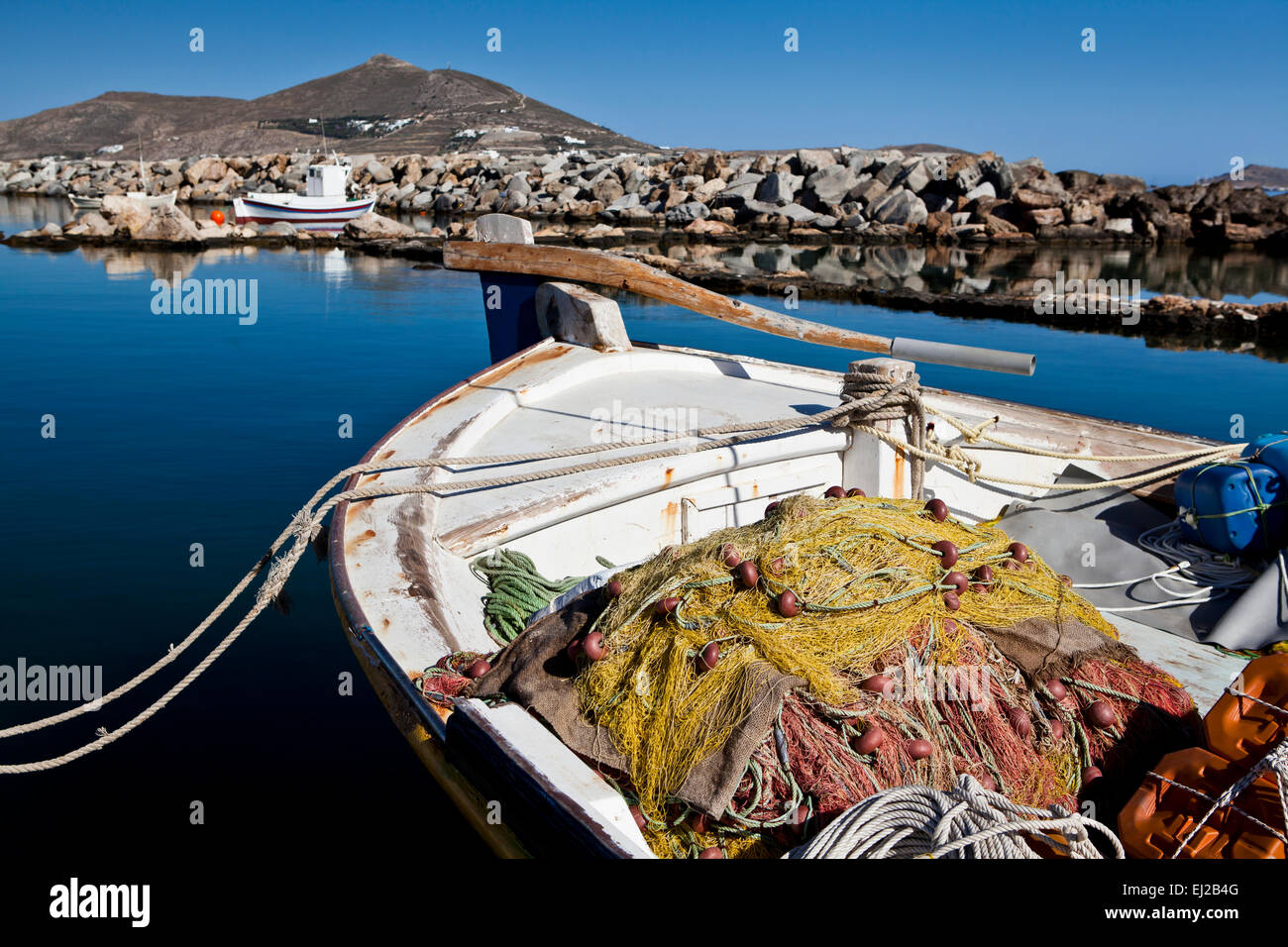 Fishing boats in the port and town of Naoussa in Paros, Greece Stock ...