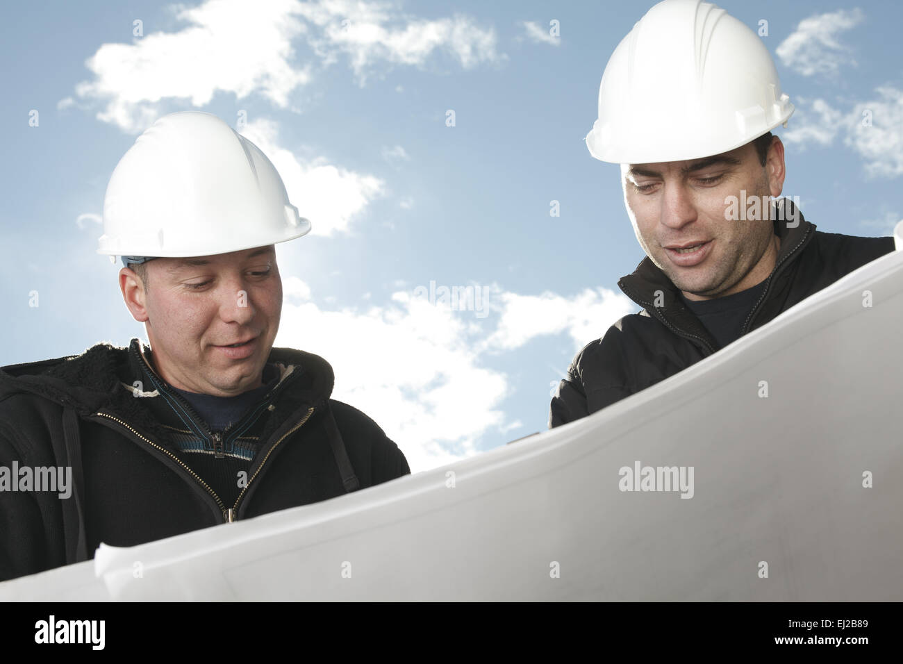 A construction men working outside Stock Photo - Alamy