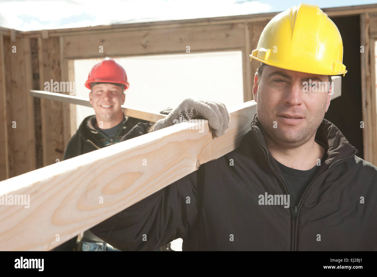 Two construction men working outside Stock Photo - Alamy