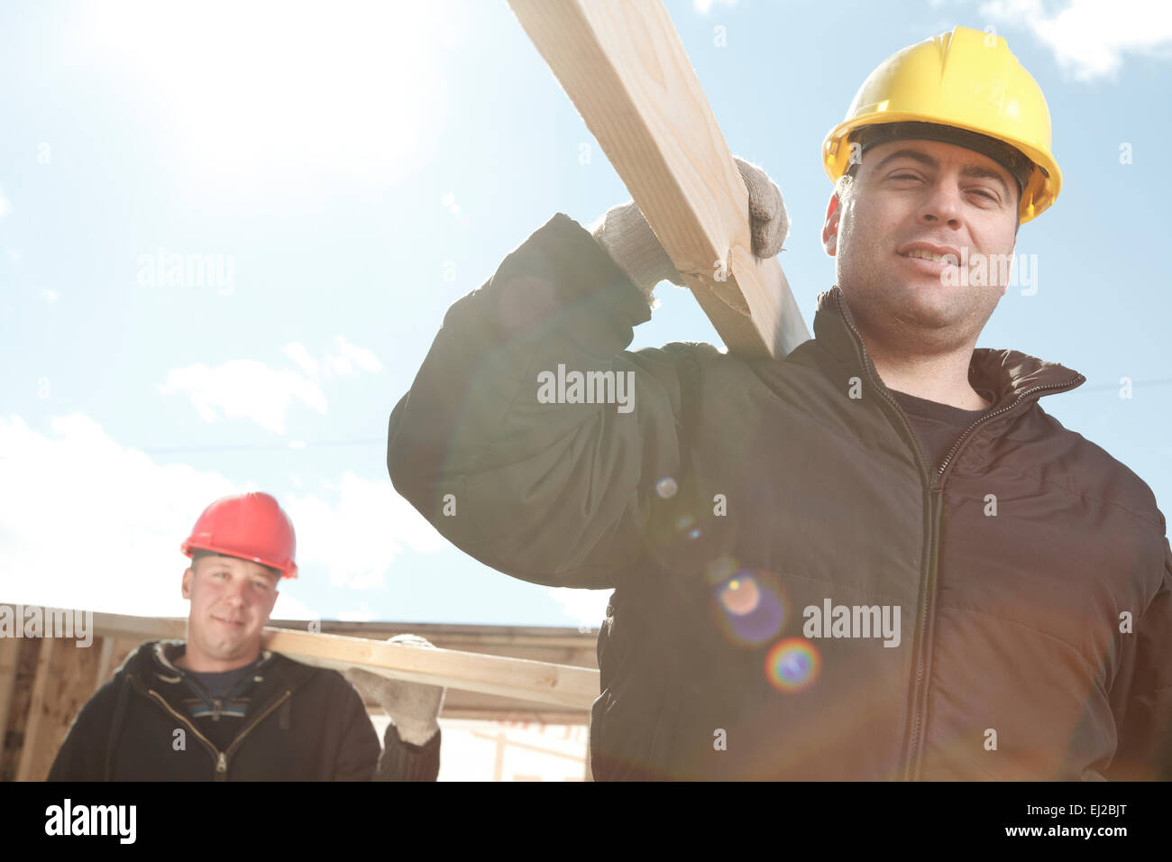 Two construction men working outside Stock Photo - Alamy