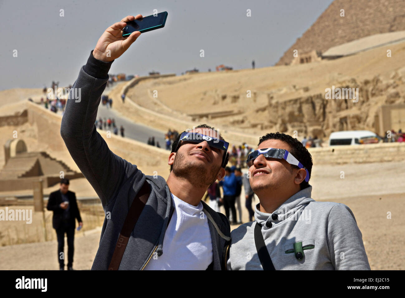 Cairo, Egypt. 20th Mar, 2015. Egyptians take selfie during look up to ...