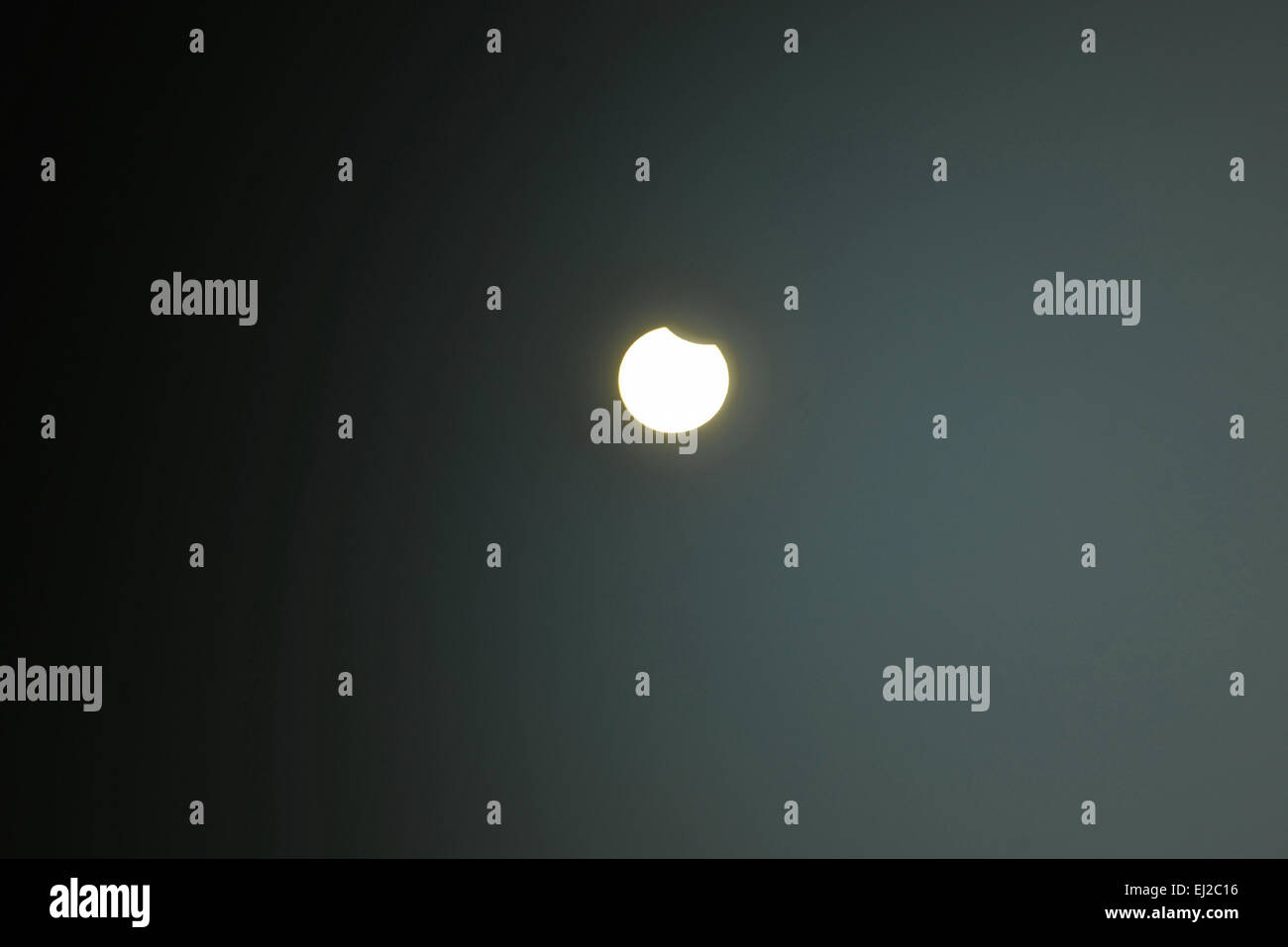 Cairo, Egypt. 20th Mar, 2015. The moon and the sun overlap in a partial ...