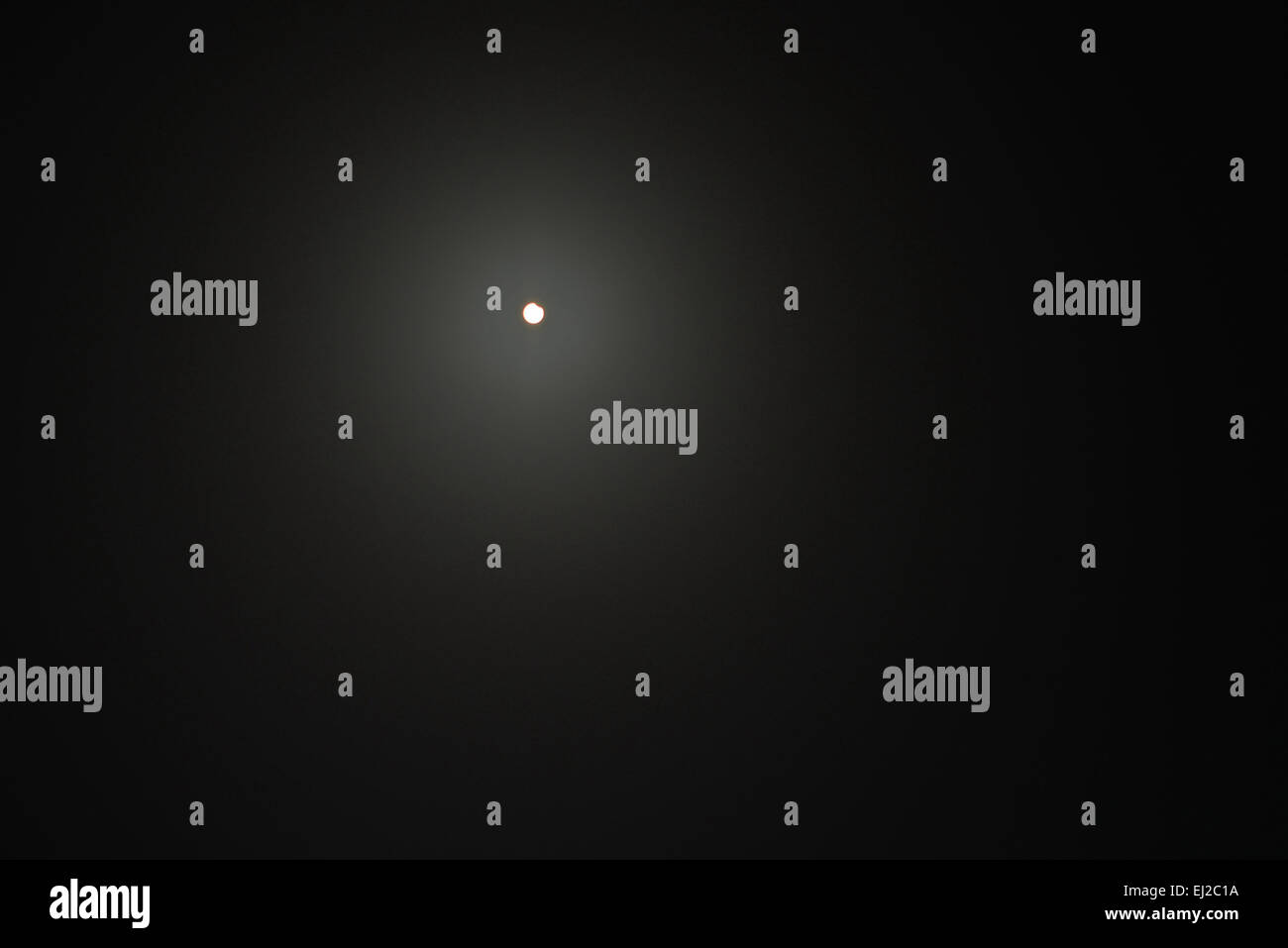 Cairo, Egypt. 20th Mar, 2015. The moon and the sun overlap in a partial ...