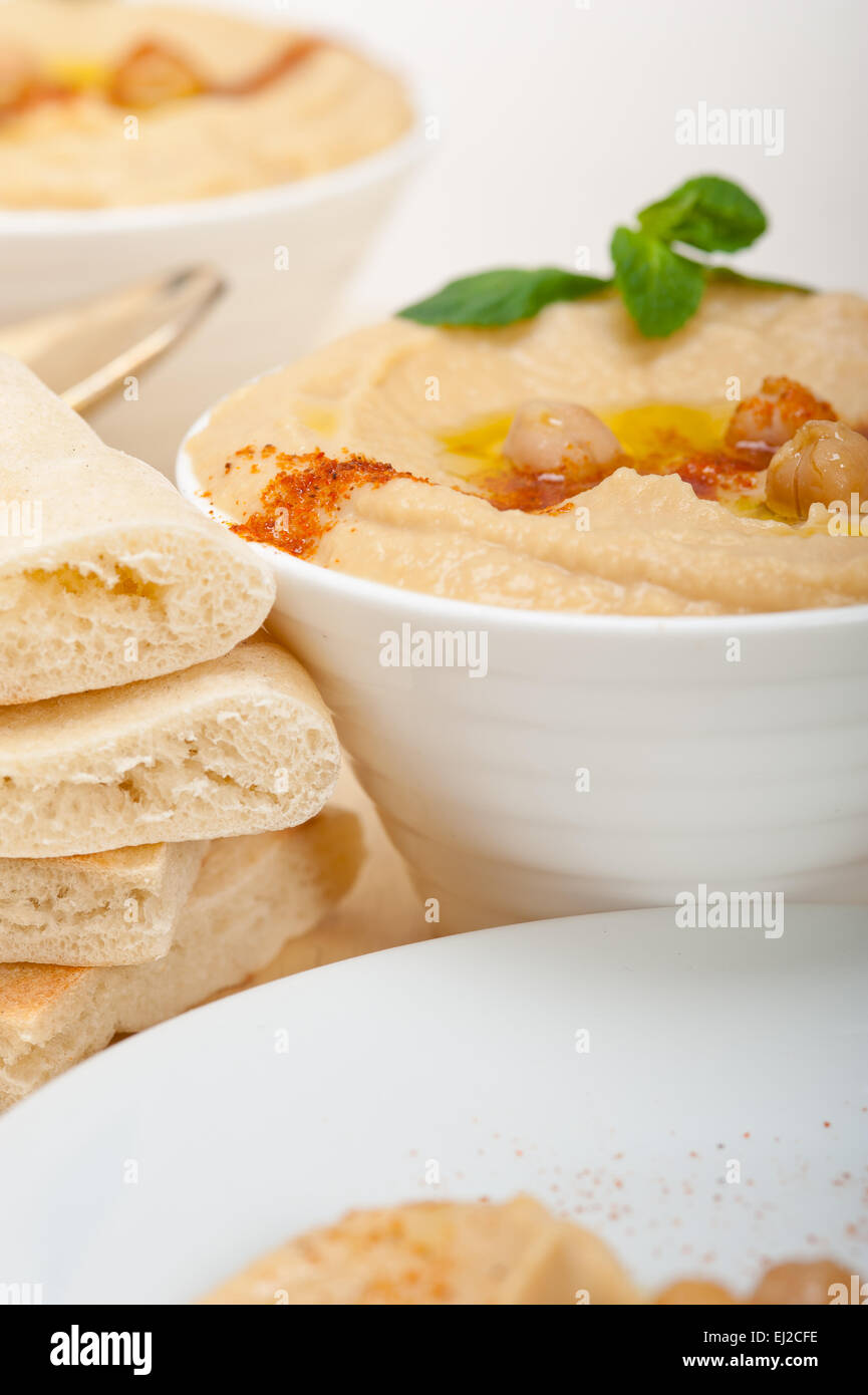 traditional chickpeas Hummus with pita bread and paprika on top Stock ...