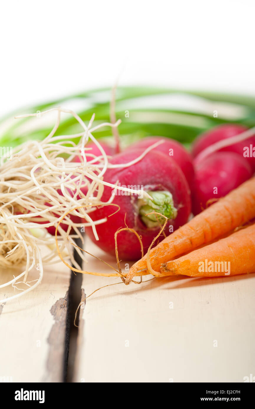raw root vegetable on a rustic white wood table Stock Photo - Alamy