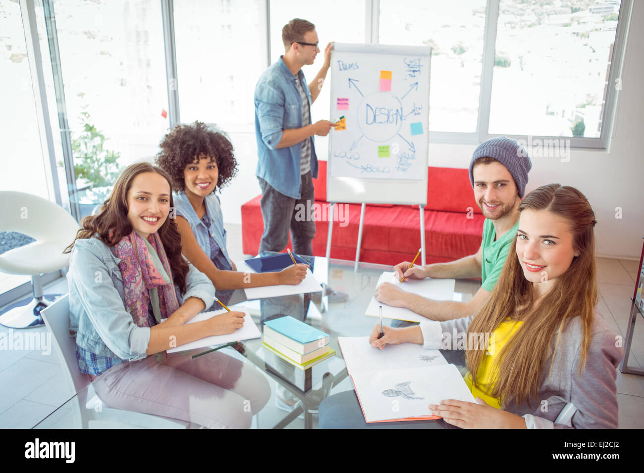 Fashion student giving a presentation Stock Photo - Alamy