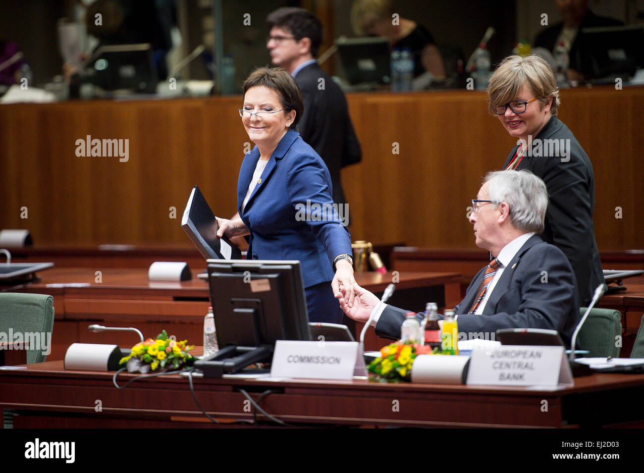 Brussels, Belgium. 20th March, 2015. Polish Prime Minister Ewa Kopacz (L) is welcomed by Jean ...