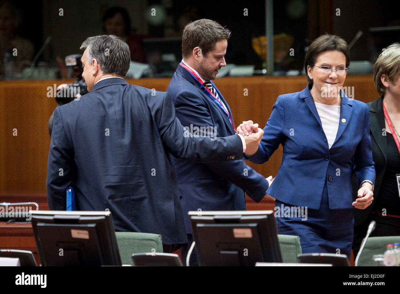 Brussels, Belgium. 20th March, 2015. Polish Prime Minister Ewa Kopacz (L) is welcomed by ...