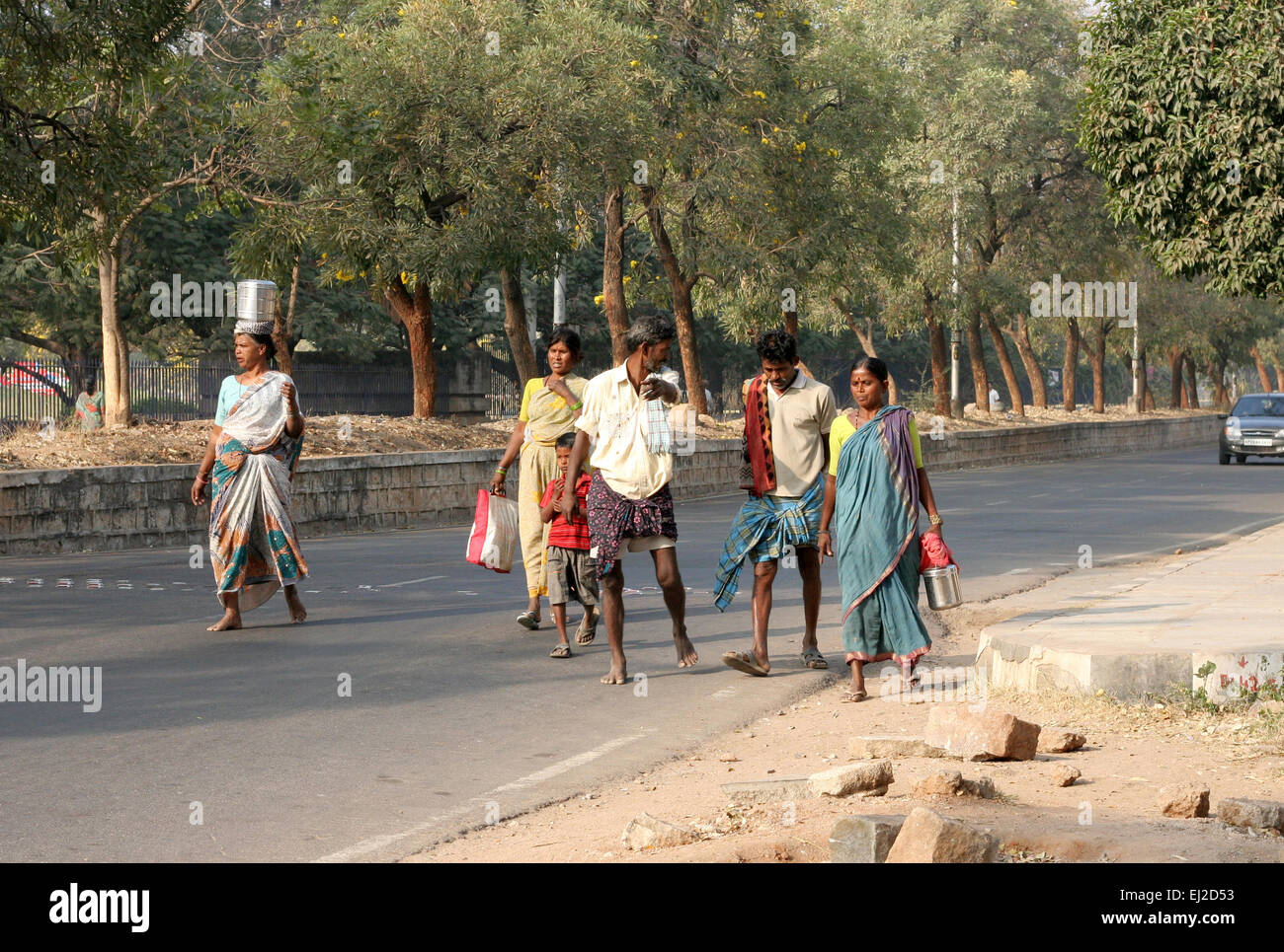 Indian poor Manual labour or construction workers on their way for work ...