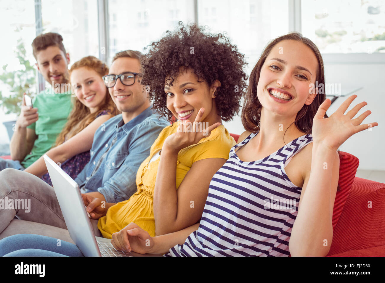 Young adult campus waving hi-res stock photography and images - Alamy
