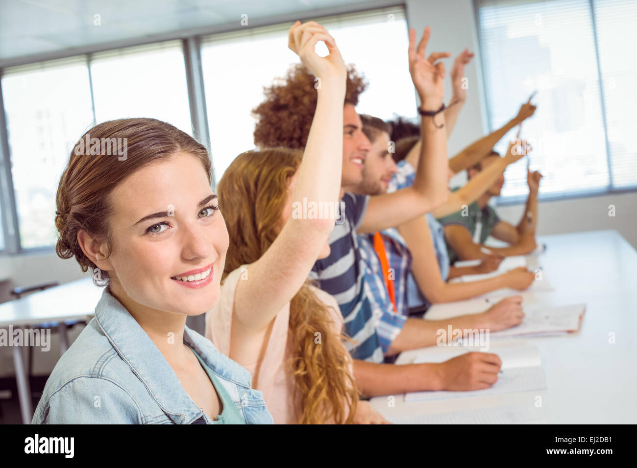 Fashion students being attentive in class Stock Photo - Alamy