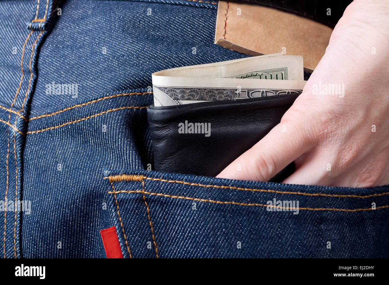 This is wallet sticking out of pocket Stock Photo - Alamy
