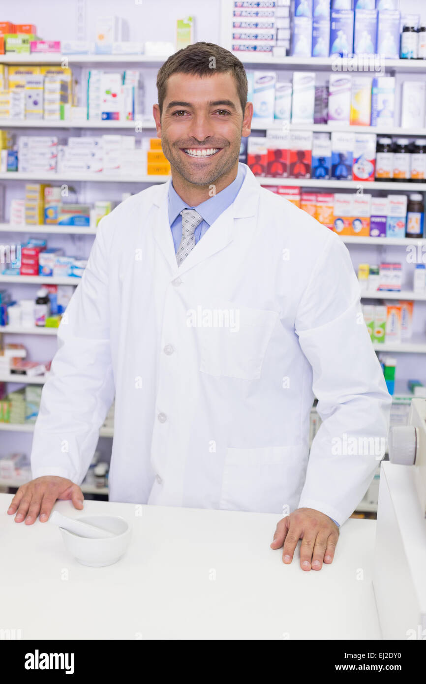 Smiling pharmacist looking at camera Stock Photo - Alamy