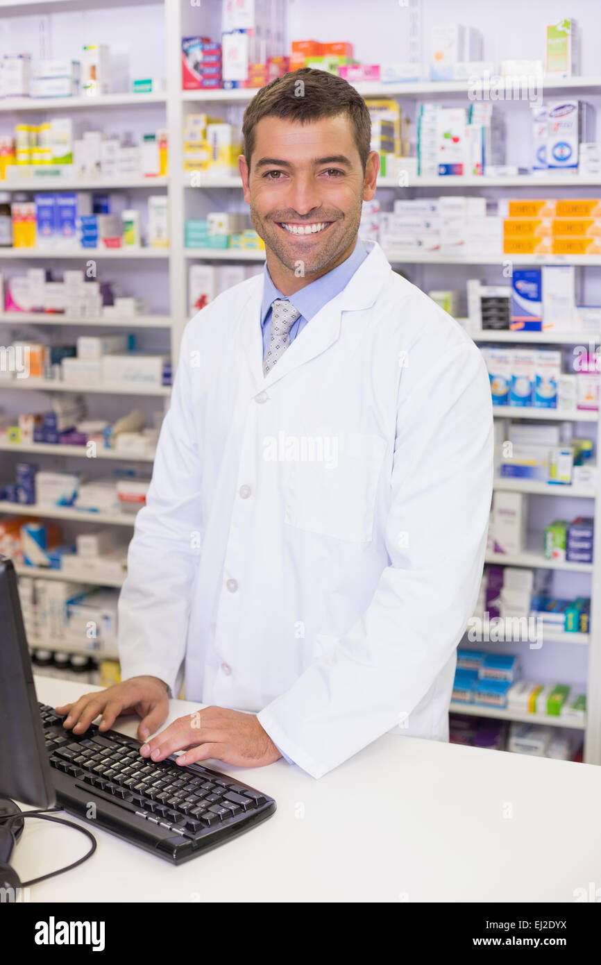 Pharmacist using the computer Stock Photo - Alamy