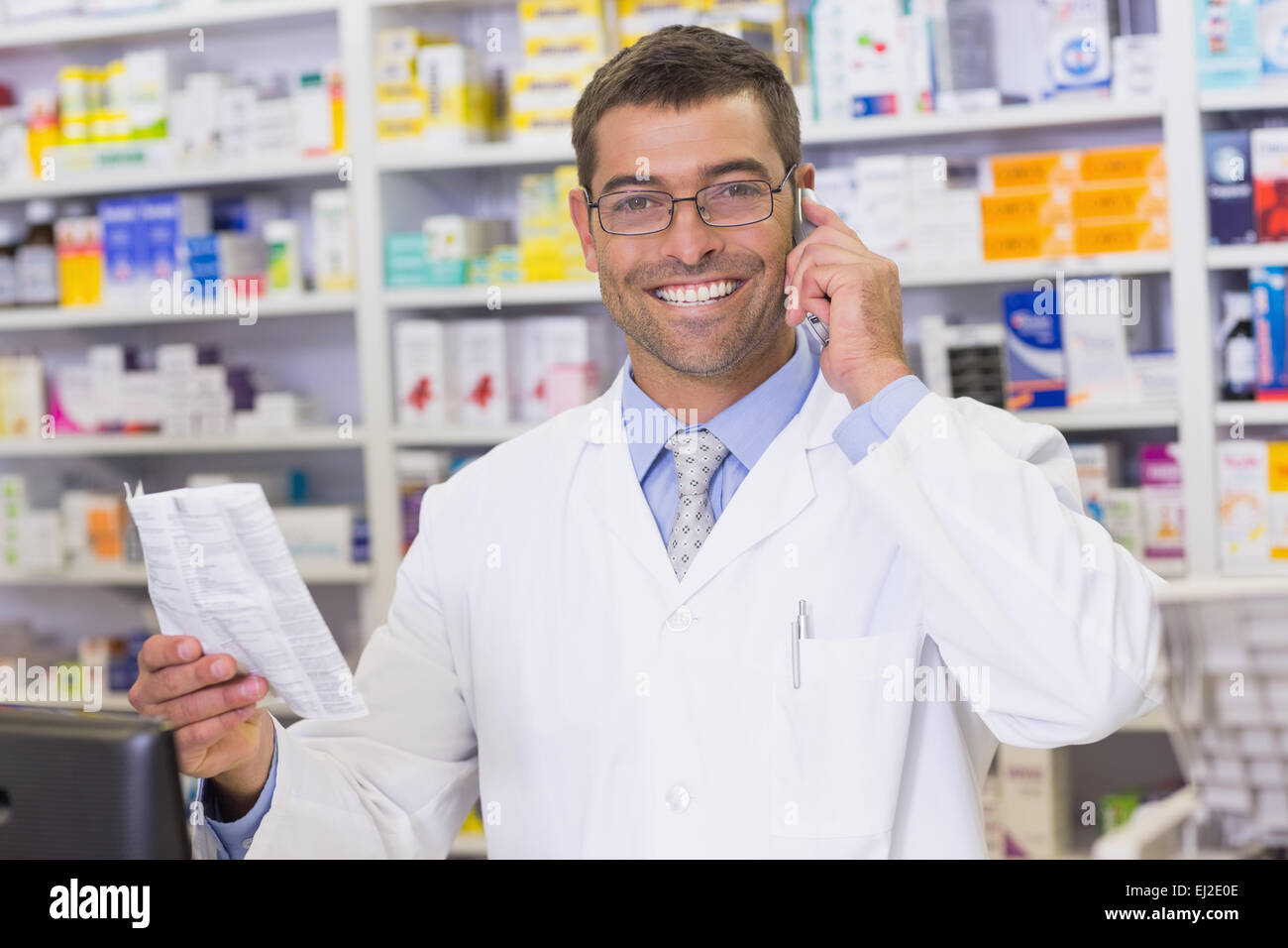 Pharmacist looking prescription on hi-res stock photography and images ...