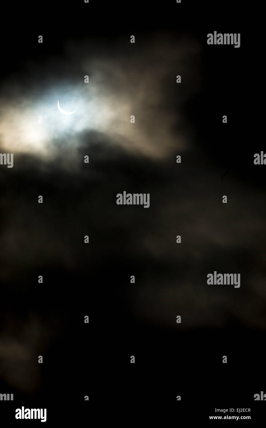 Partial eclipse over Halifax West Yorkshire March 2015 Stock Photo - Alamy