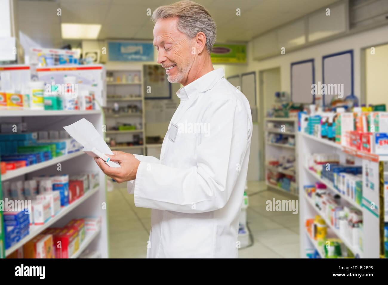 Pharmacy reading prescription pharmacist hi-res stock photography and ...