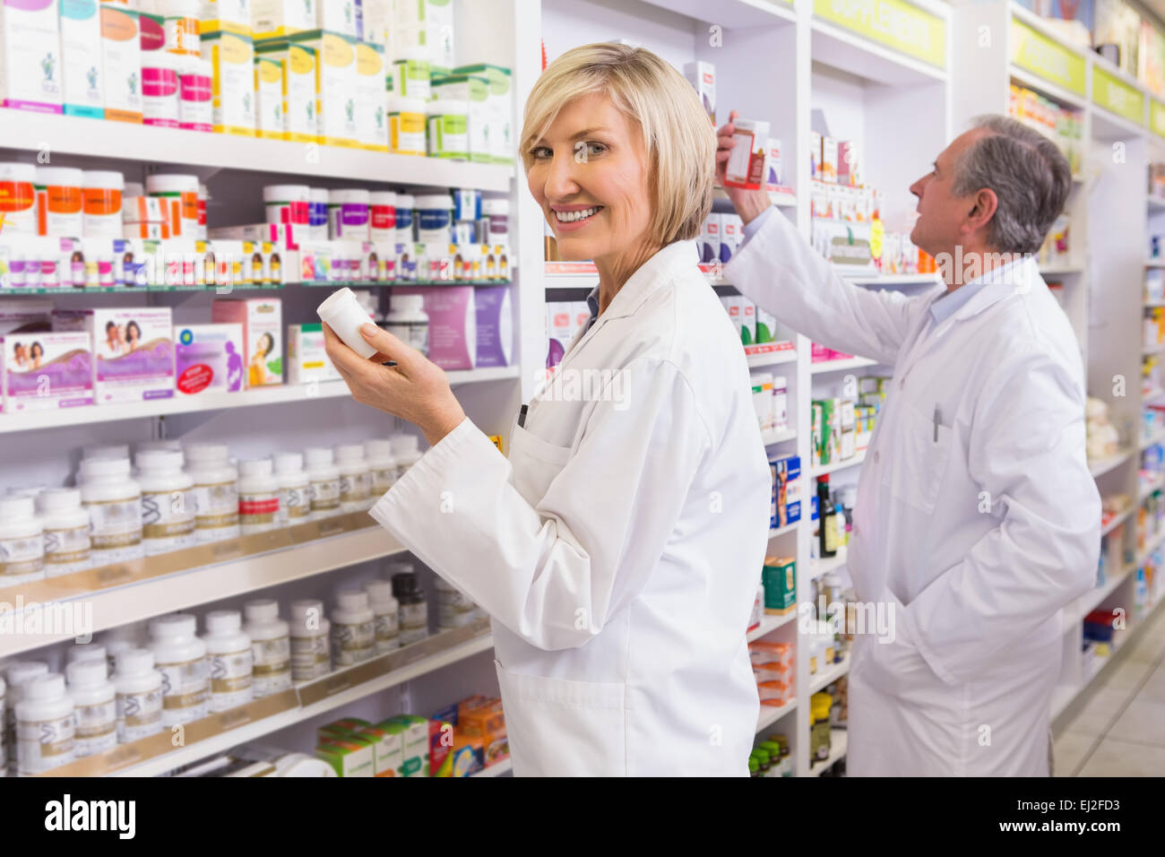 Portrait mature female pharmacists hi-res stock photography and images ...