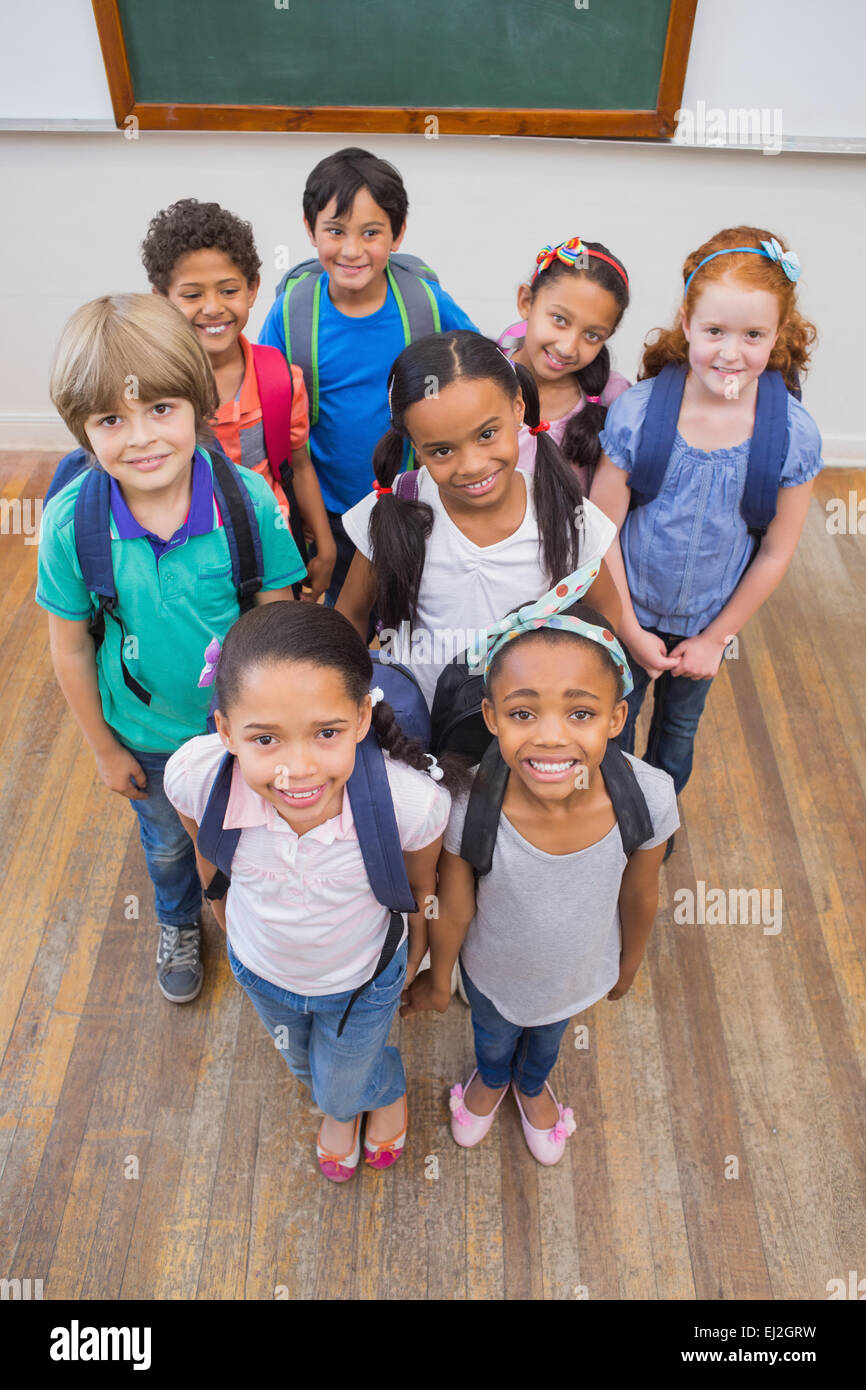 Smiling pupils in classroom Stock Photo - Alamy