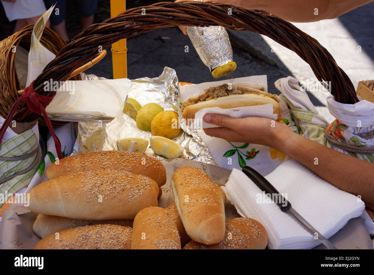 Palermo, Sicily. Capo market. Man selling frittola sandwiches Stock ...